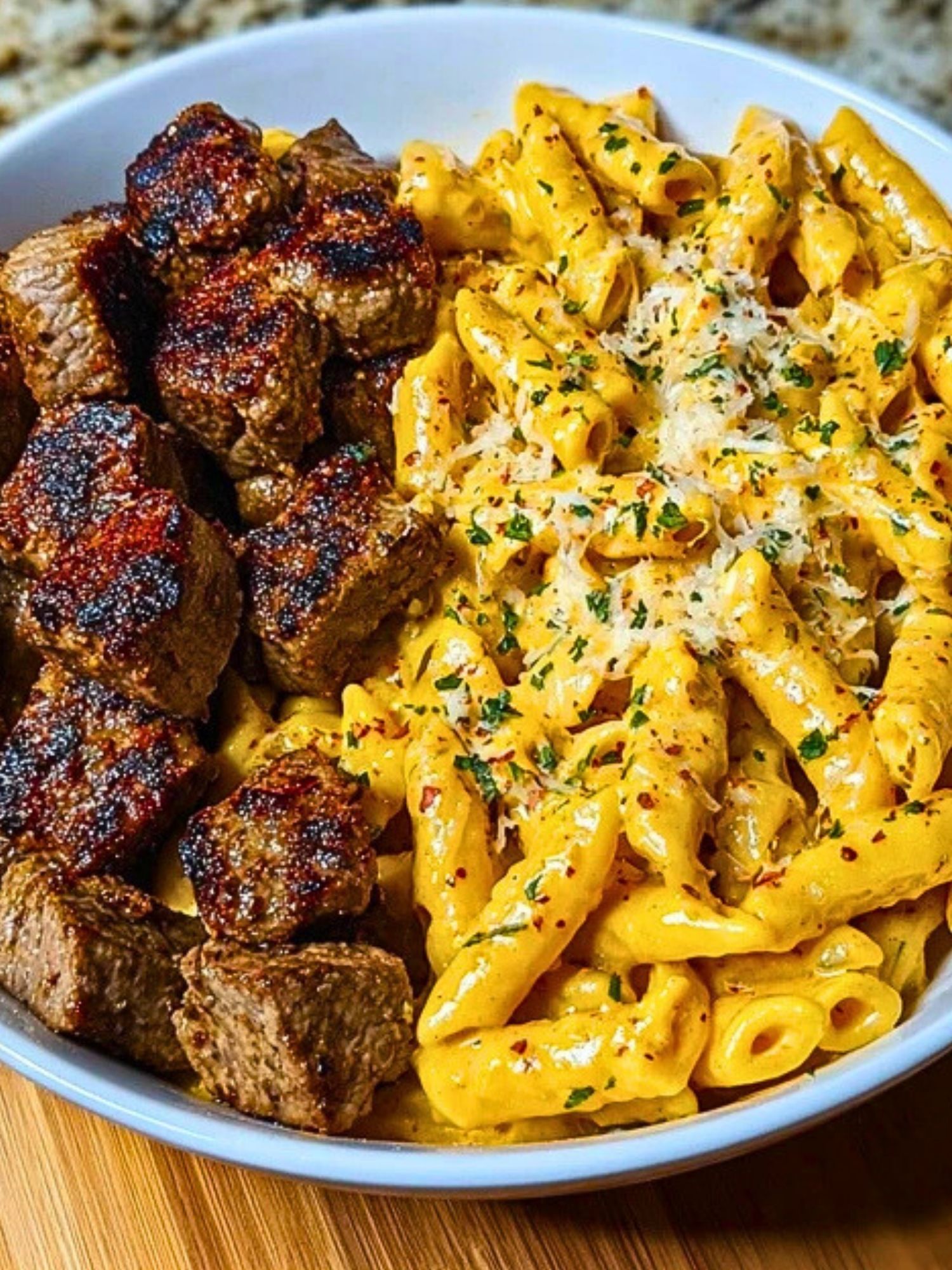 Savory Cajun Steak Tips with Cheesy Penne Parmesan Sauce
