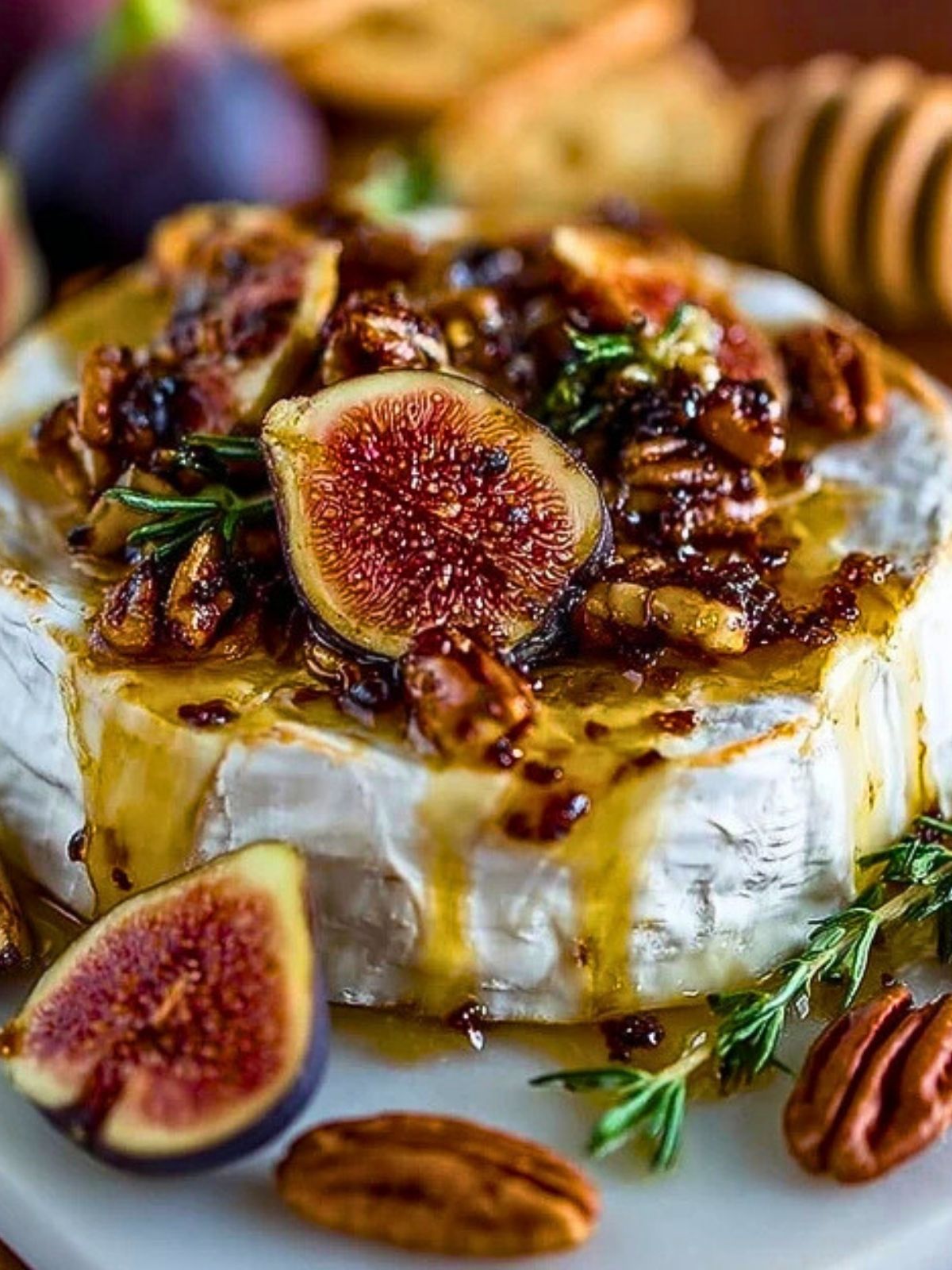 Warm Baked Brie Topped with Figs and Pecans